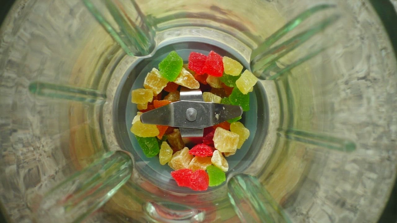 Grinding sweets in the blender, top view - Free Stock Video
