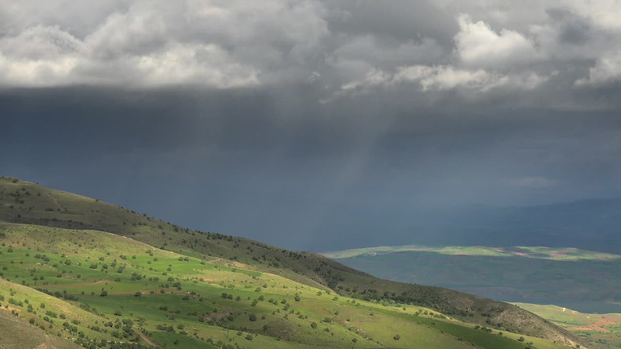 Rain cloud moving over the mountain - Free Stock Video