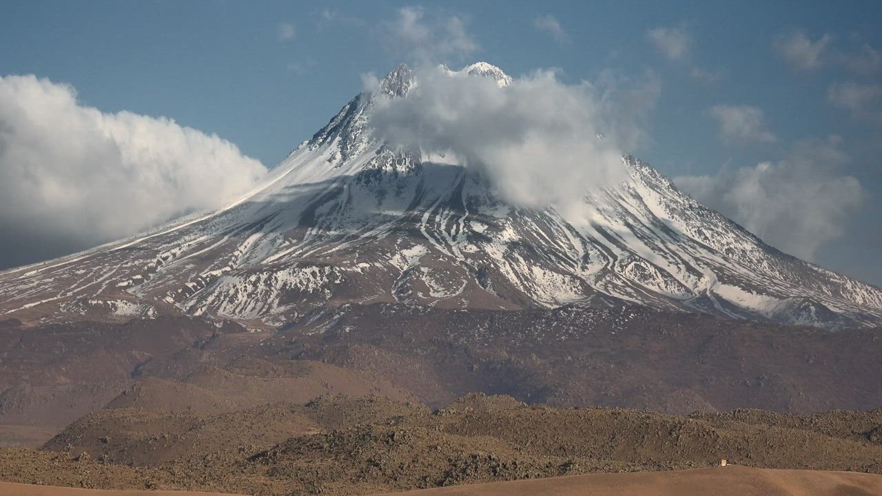 Volcano with snow at the peak - Free Stock Video