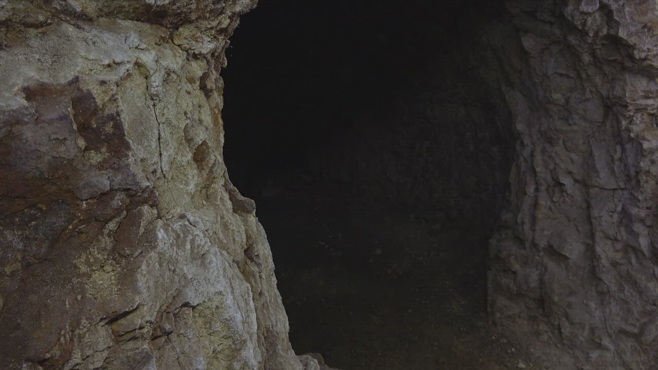 Entrance of a rock cave - Free Stock Video