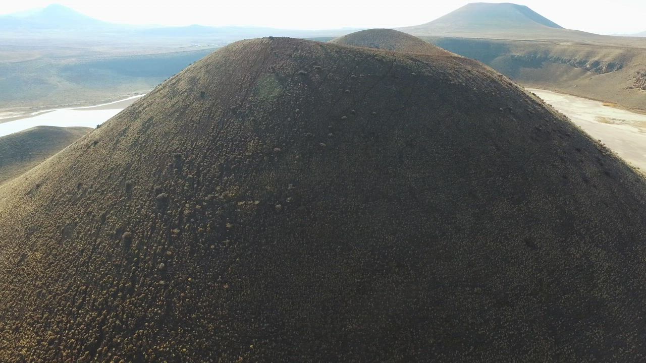 Flying through a volcanic crater - Free Stock Video