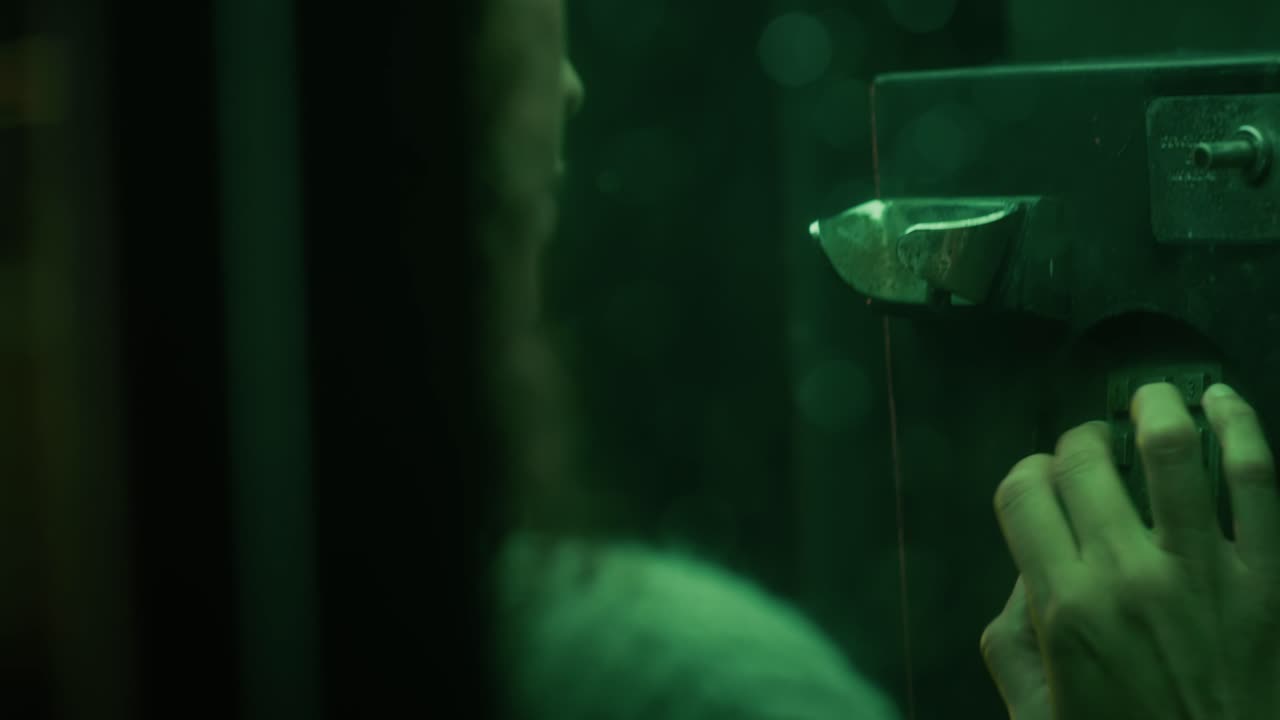 Woman Dialing Inside the Telephone Booth at Night - Free Stock Video